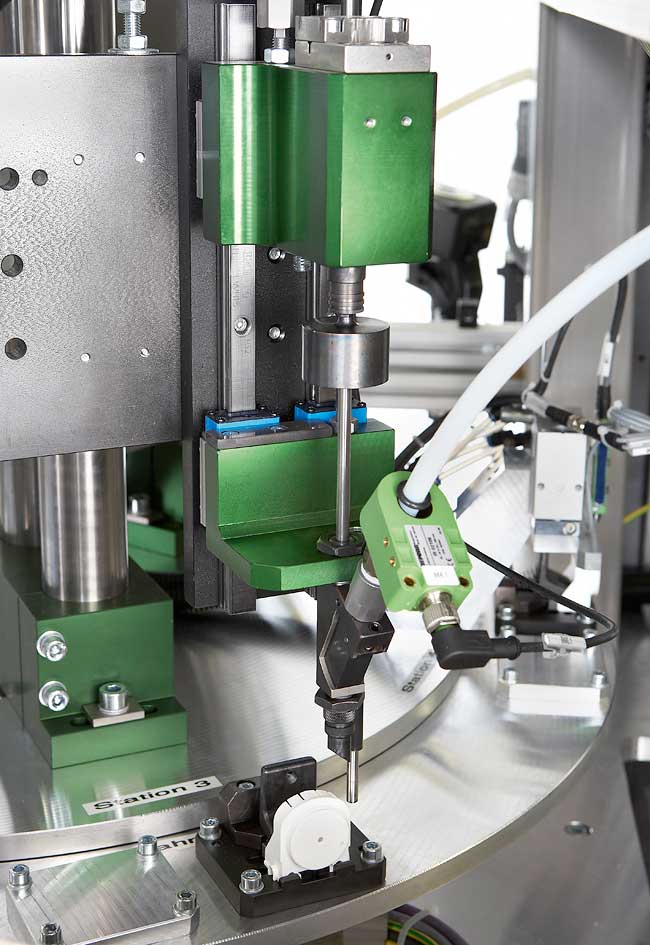 Press-insertion system in combination with suitable feeding machines ...